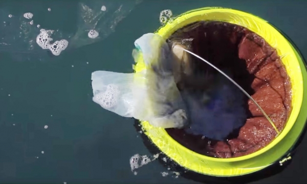 Automated trash collector catches floating trash, oil, fuel and ...